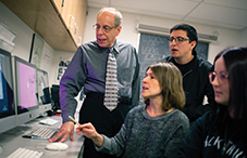 Dr. Edward Wasserman (left) with his team at the University of Iowa.